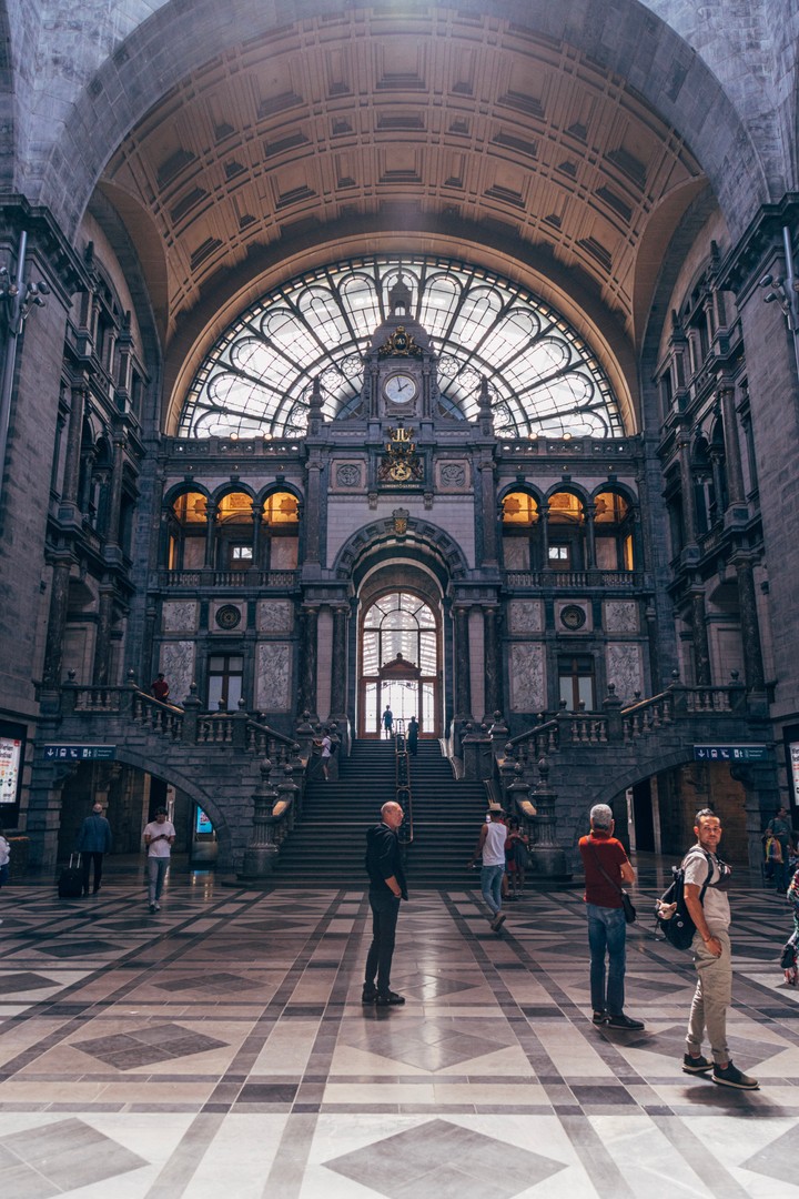 Symmetrical neo-Baroque splendour and puppy traveller inside Antwerp ...
